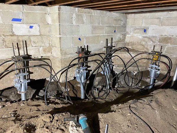 Foundation Repair Using Push Piers And Helical Piers | WATERPROOF! Magazine